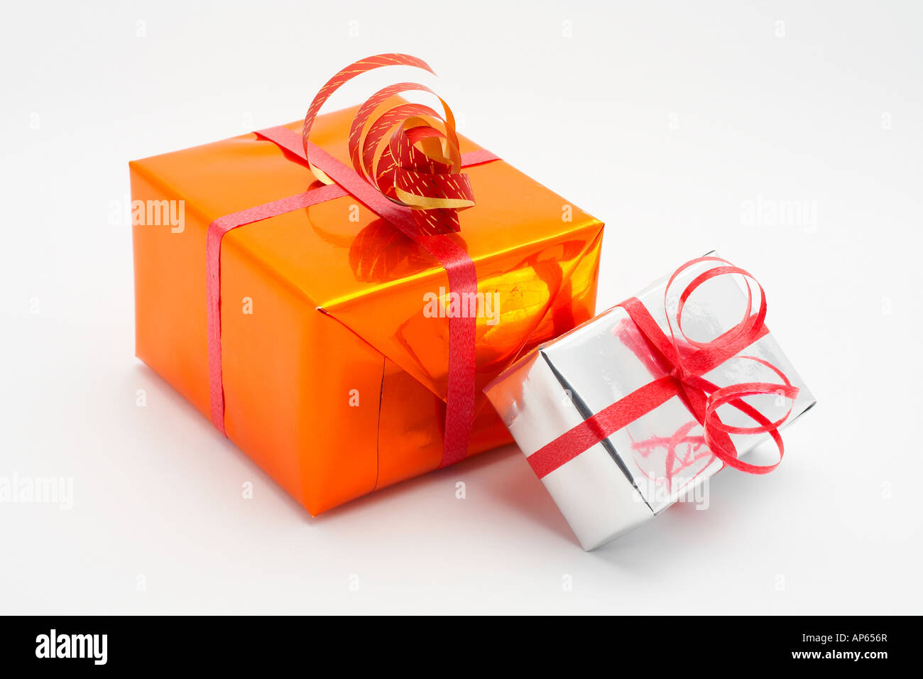 Two gift boxes on white background Stock Photo - Alamy