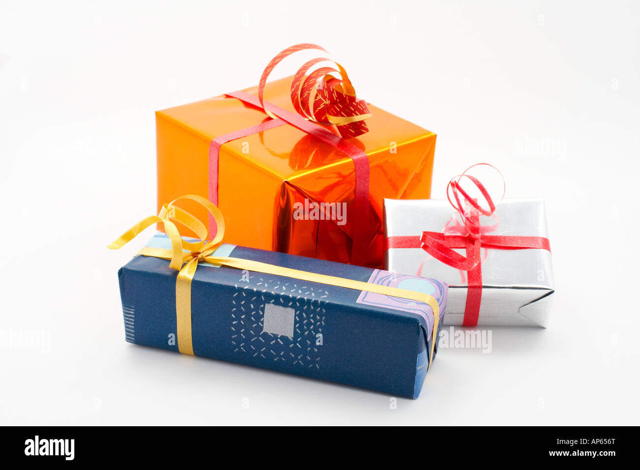Three gift boxes on white background Stock Photo - Alamy