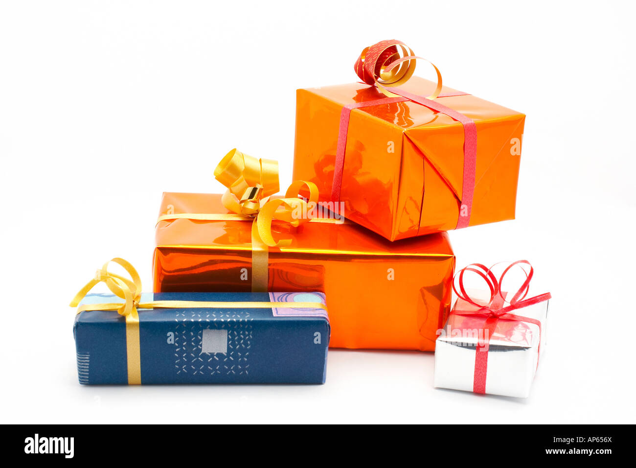 Four gift boxes on white background Stock Photo - Alamy