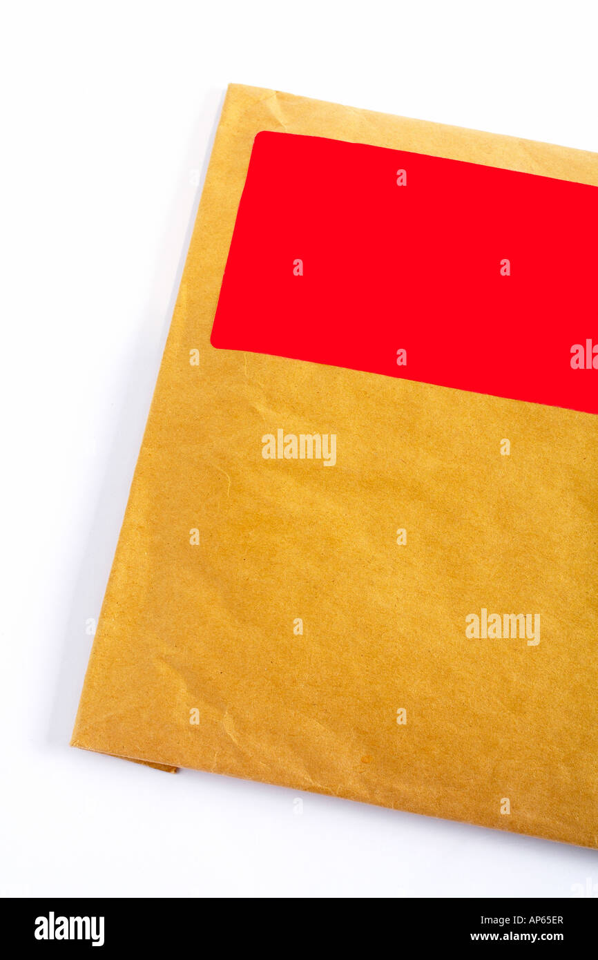 Detail of envelope with blank red sticker isolated on white background ...