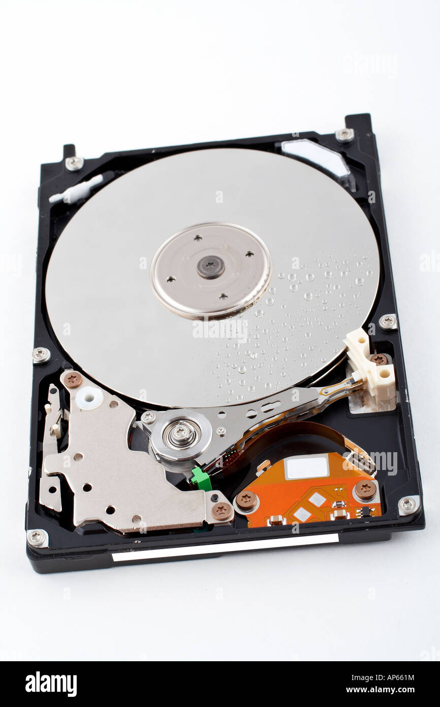 Close up of the opened hard disk drive with water drops Stock Photo - Alamy