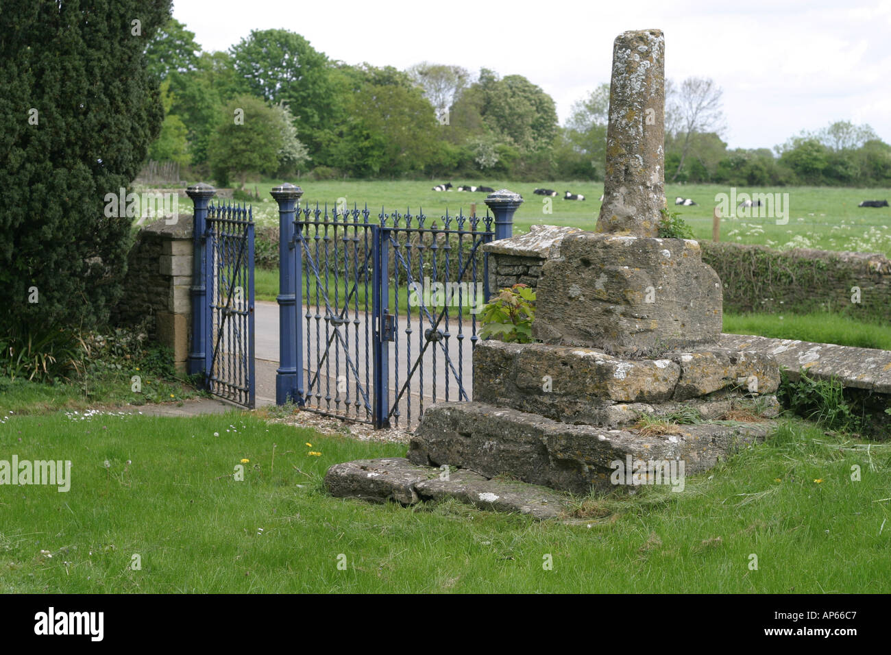 Base of ancient cross in churchyard of Langford church in Oxfordshire ...