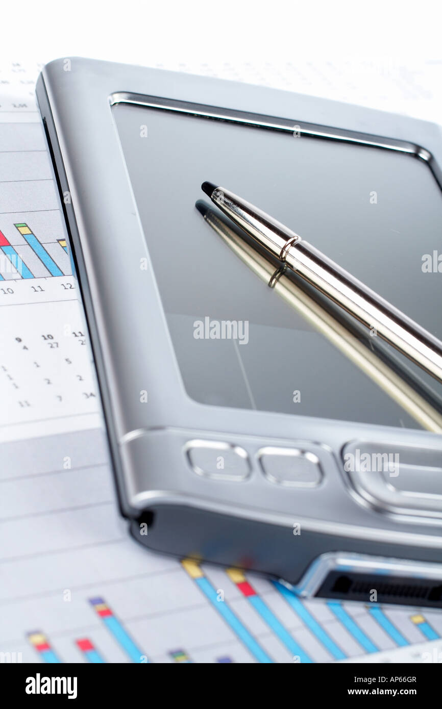 PDA on market business financial chart background Stock Photo - Alamy