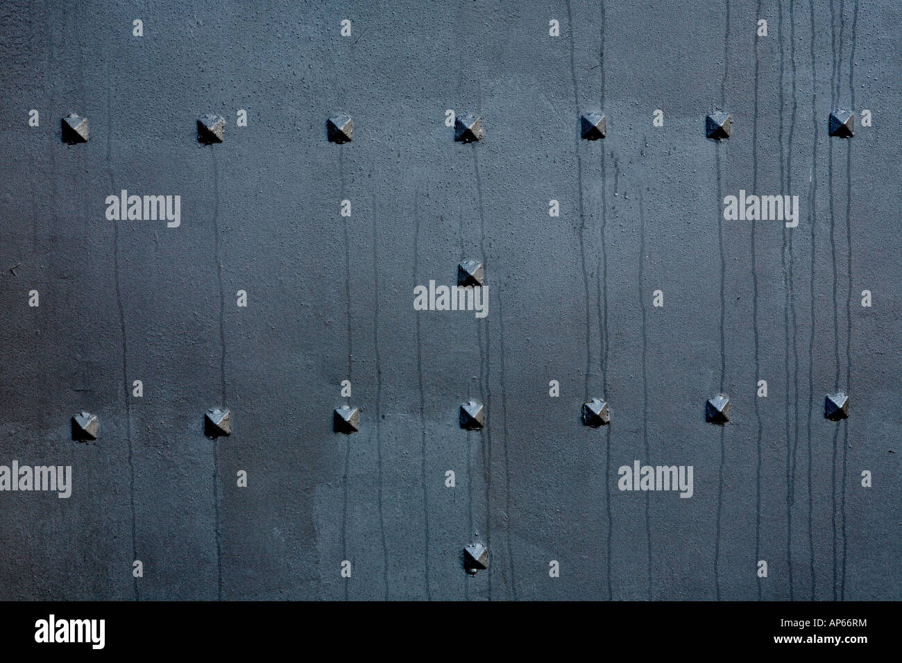 A old metal background with some rivets Stock Photo - Alamy