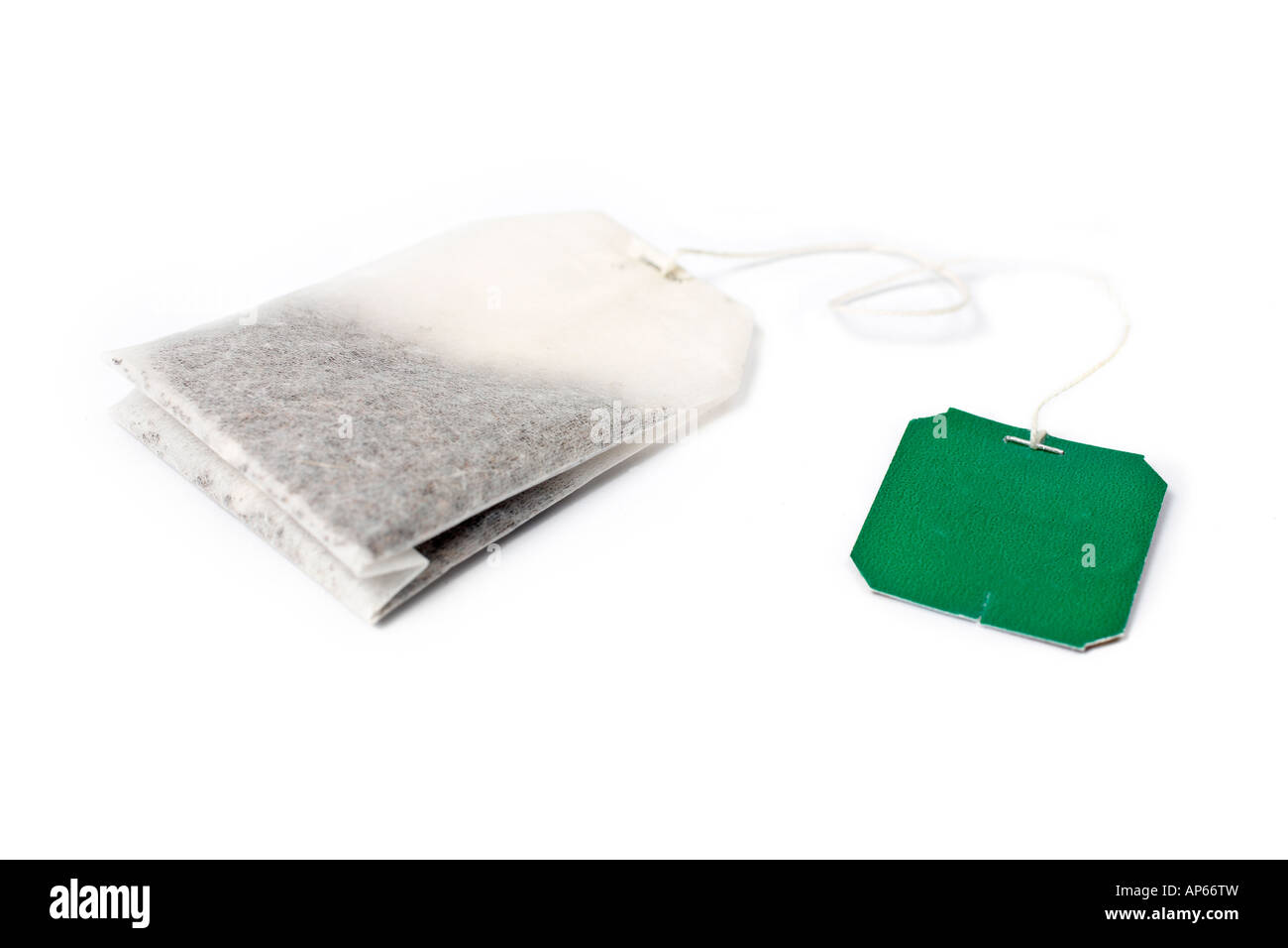 A tea bag with green label Soft shadow Stock Photo - Alamy