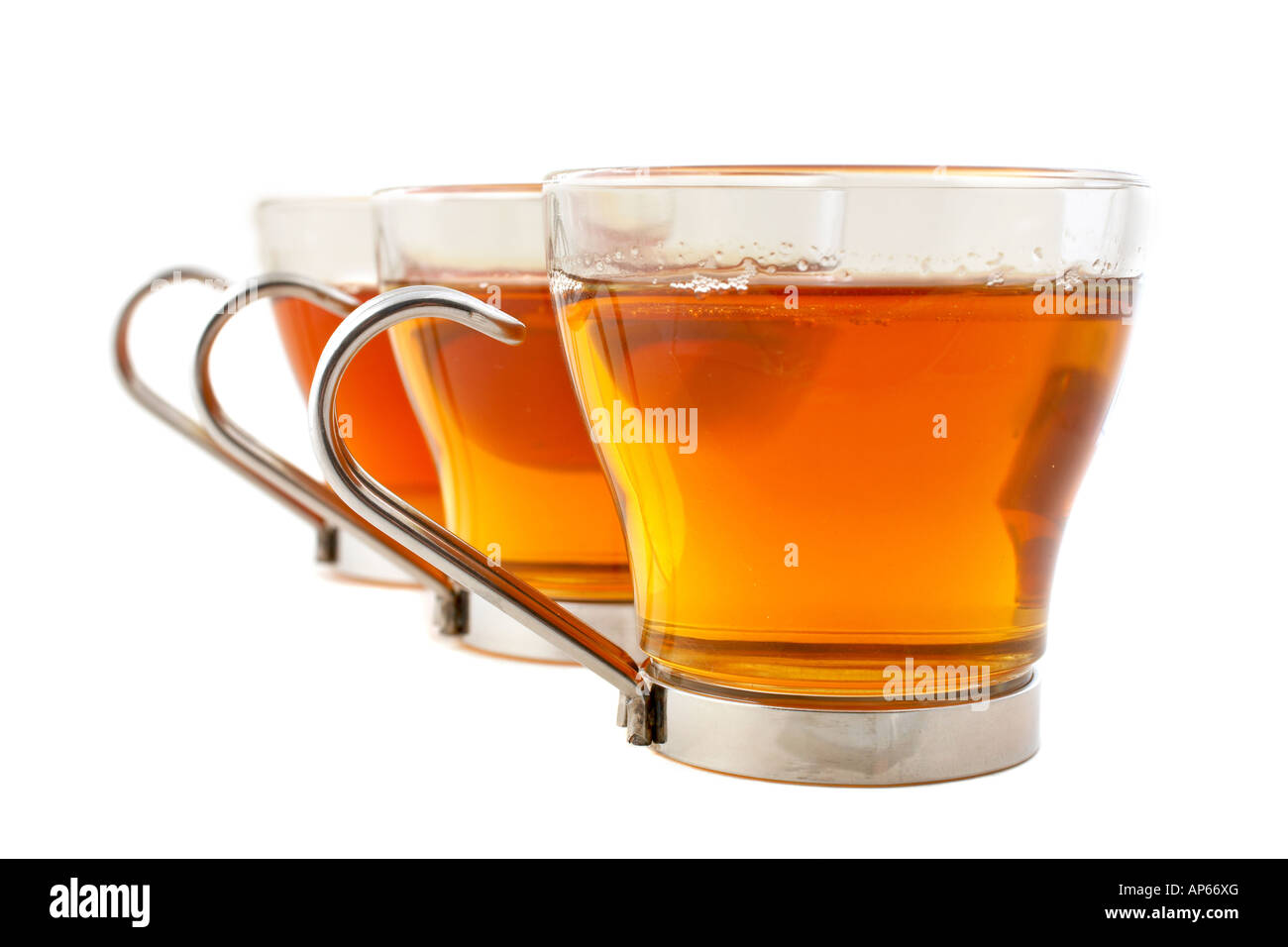 Three glass cups of tea Shallow dof Stock Photo - Alamy