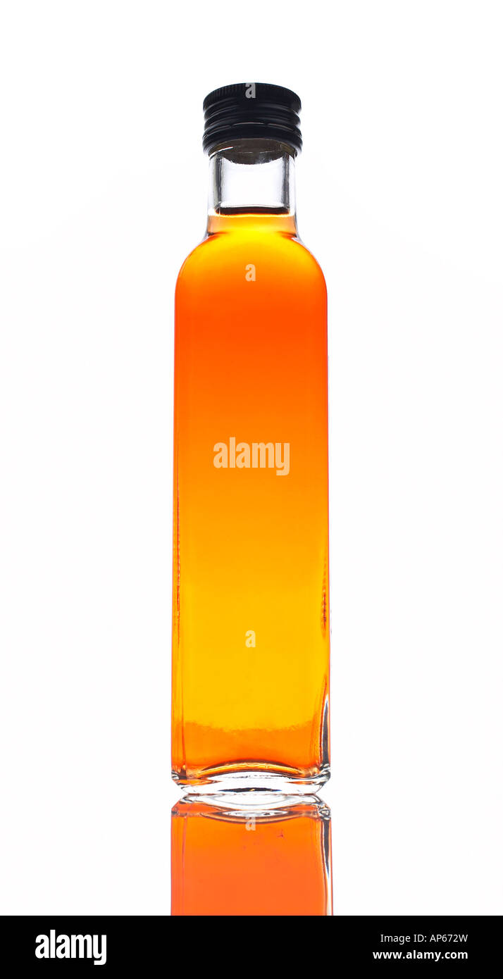 One bottle of vinegar reflected on white background Stock Photo - Alamy