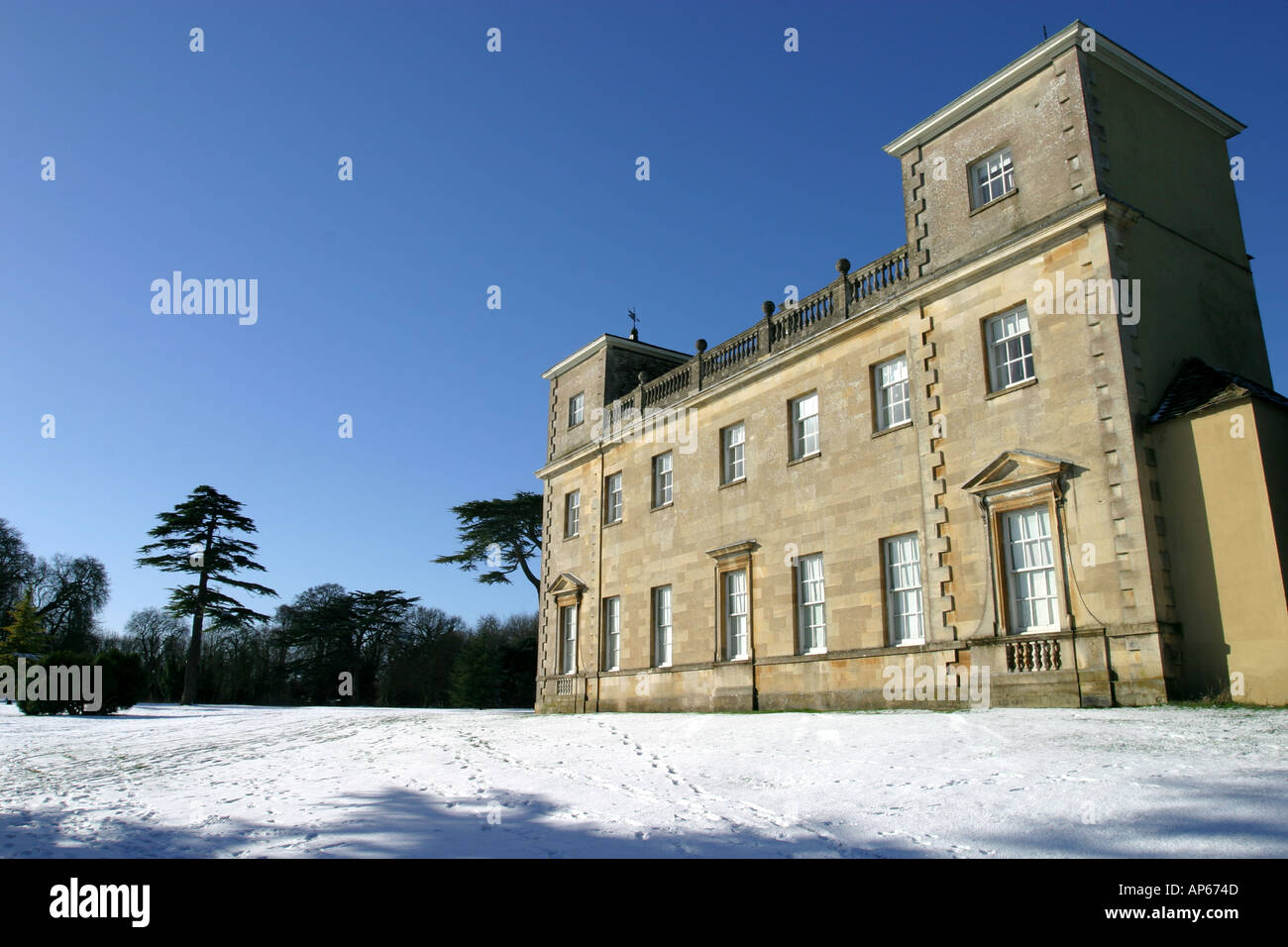 The mansion house and surrounding park of Lydiard Tregoze in the snow ...