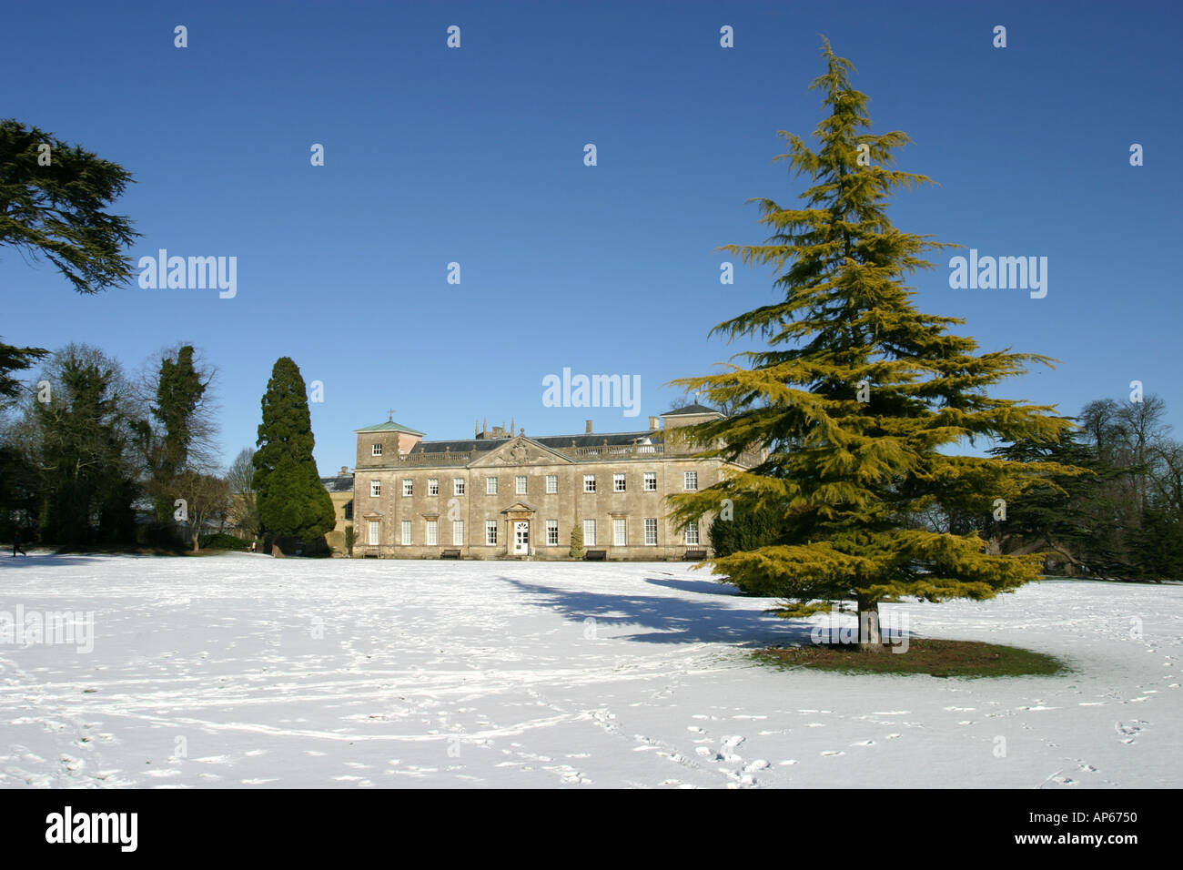 The mansion house and surrounding park of Lydiard Tregoze in the snow ...