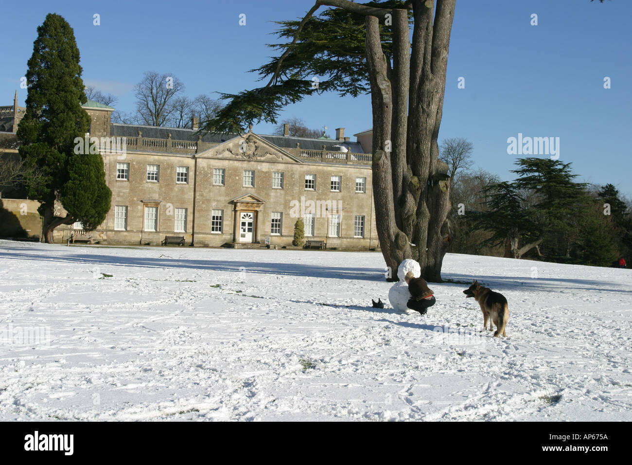 The mansion house and surrounding park of Lydiard Tregoze in the snow ...