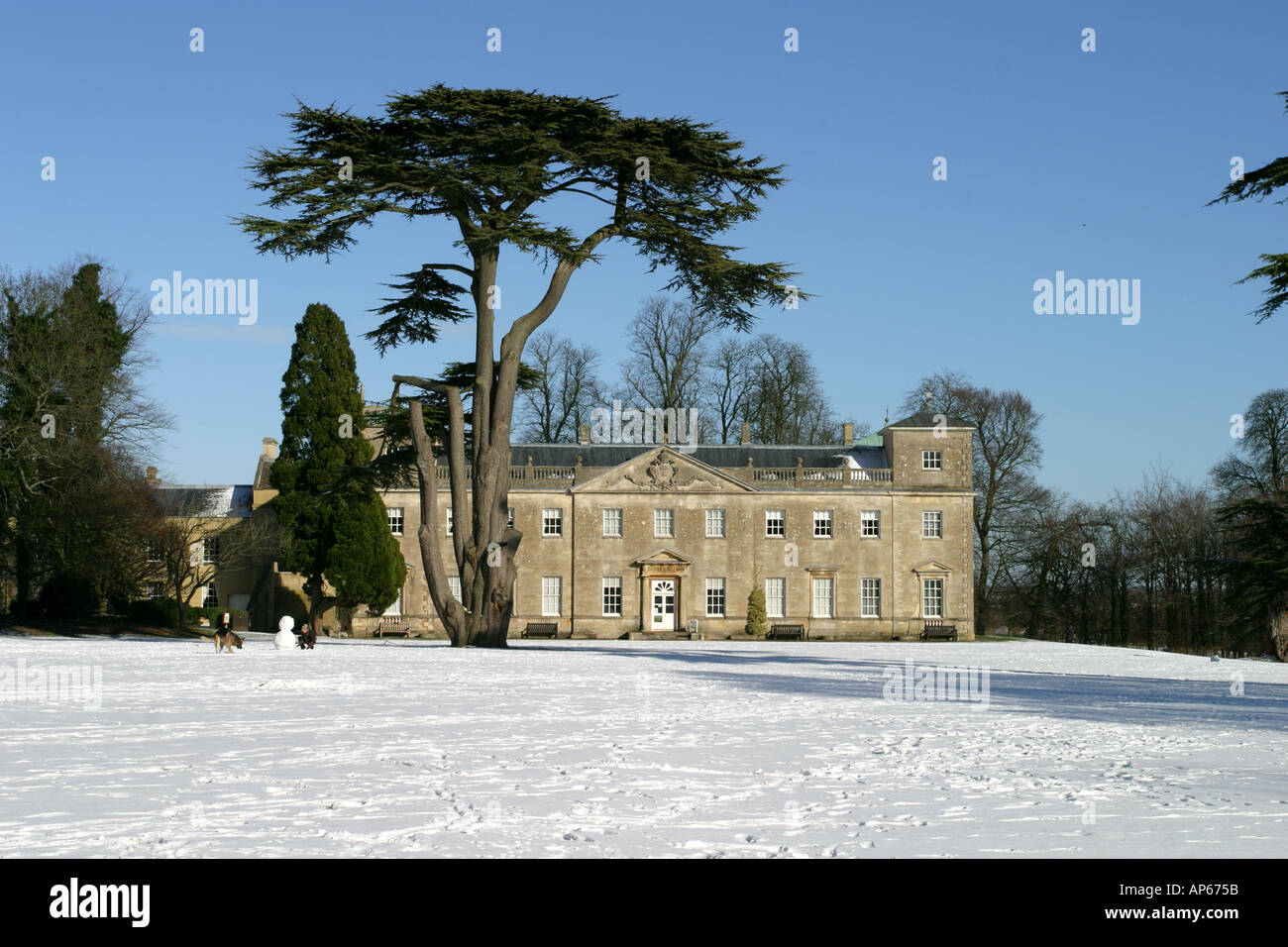 The mansion house and surrounding park of Lydiard Tregoze in the snow ...