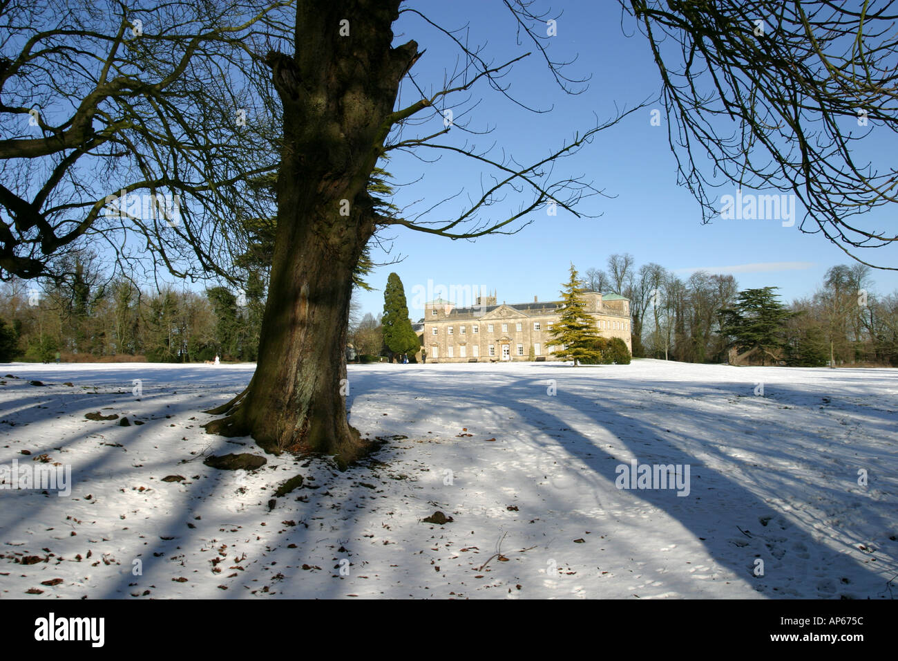 The mansion house and surrounding park of Lydiard Tregoze in the snow ...