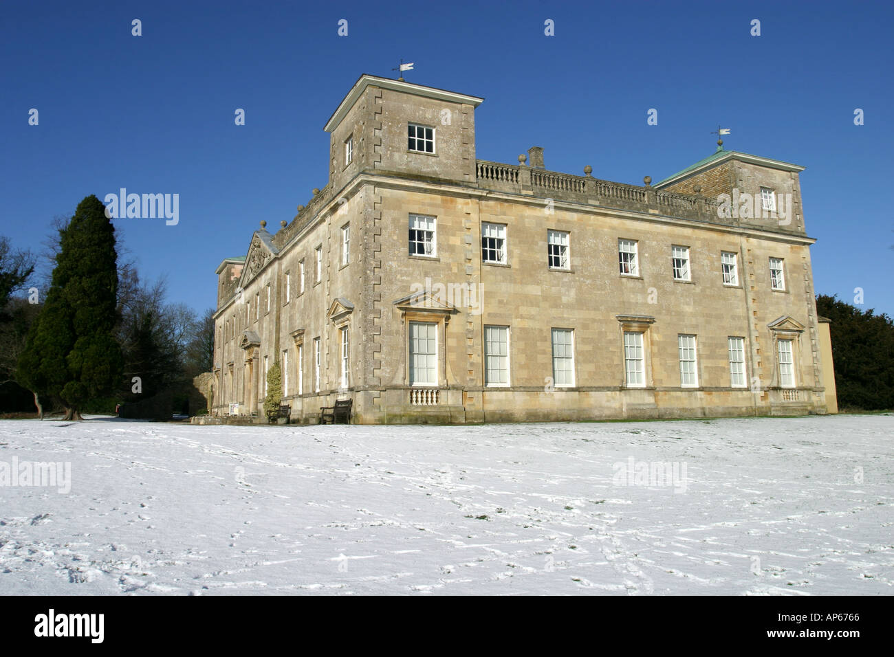 The mansion house and surrounding park of Lydiard Tregoze in the snow ...