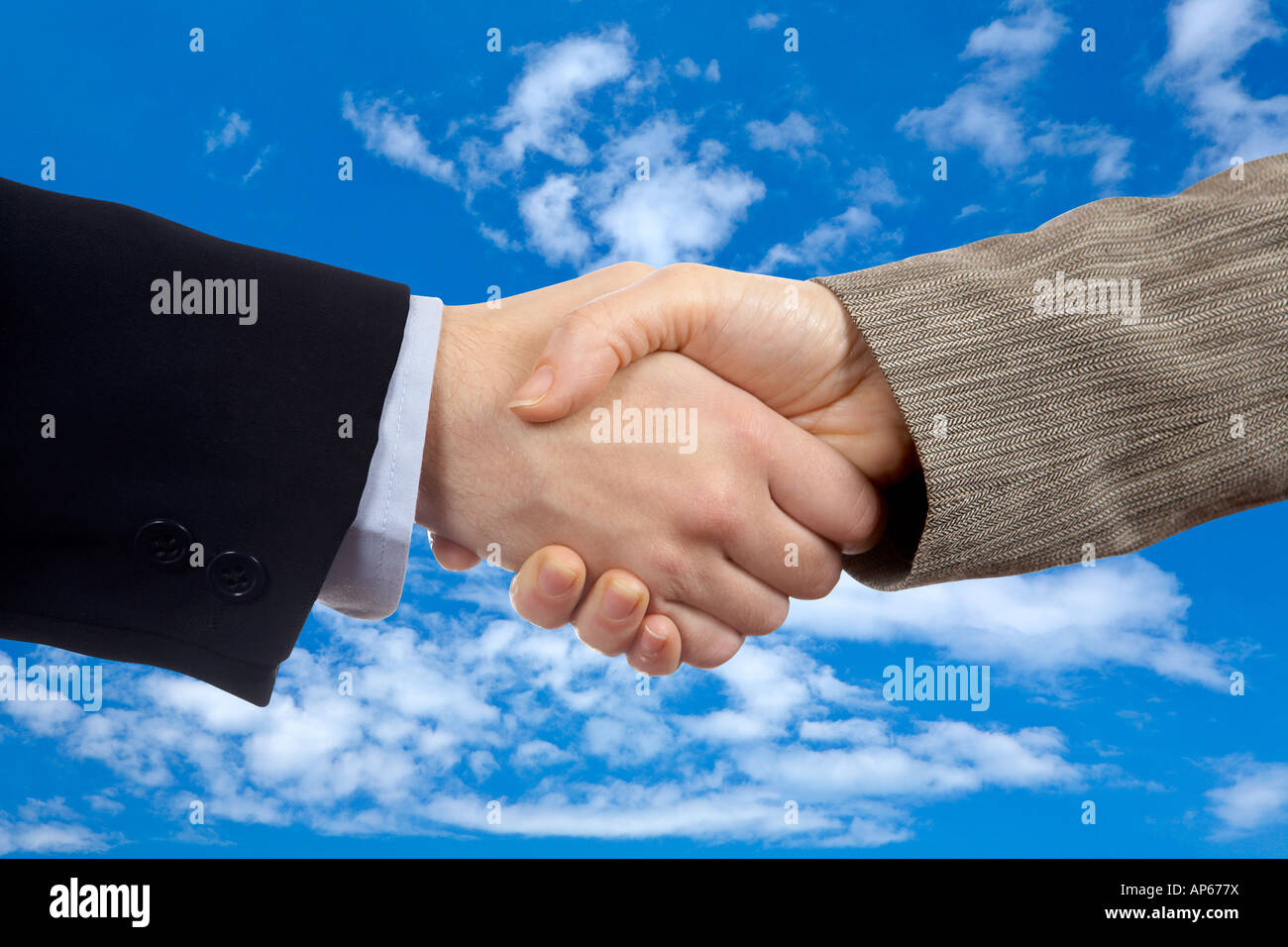Business handshake over a sky background Stock Photo - Alamy