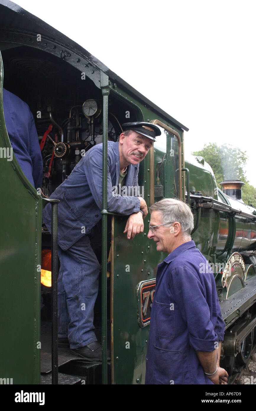 The driver and fireman chat to a visitor on the footplate of Foremarke ...