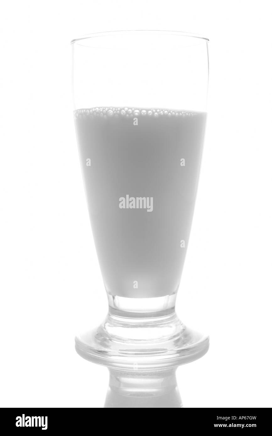 A glass of fresh milk reflected on white background Stock Photo - Alamy