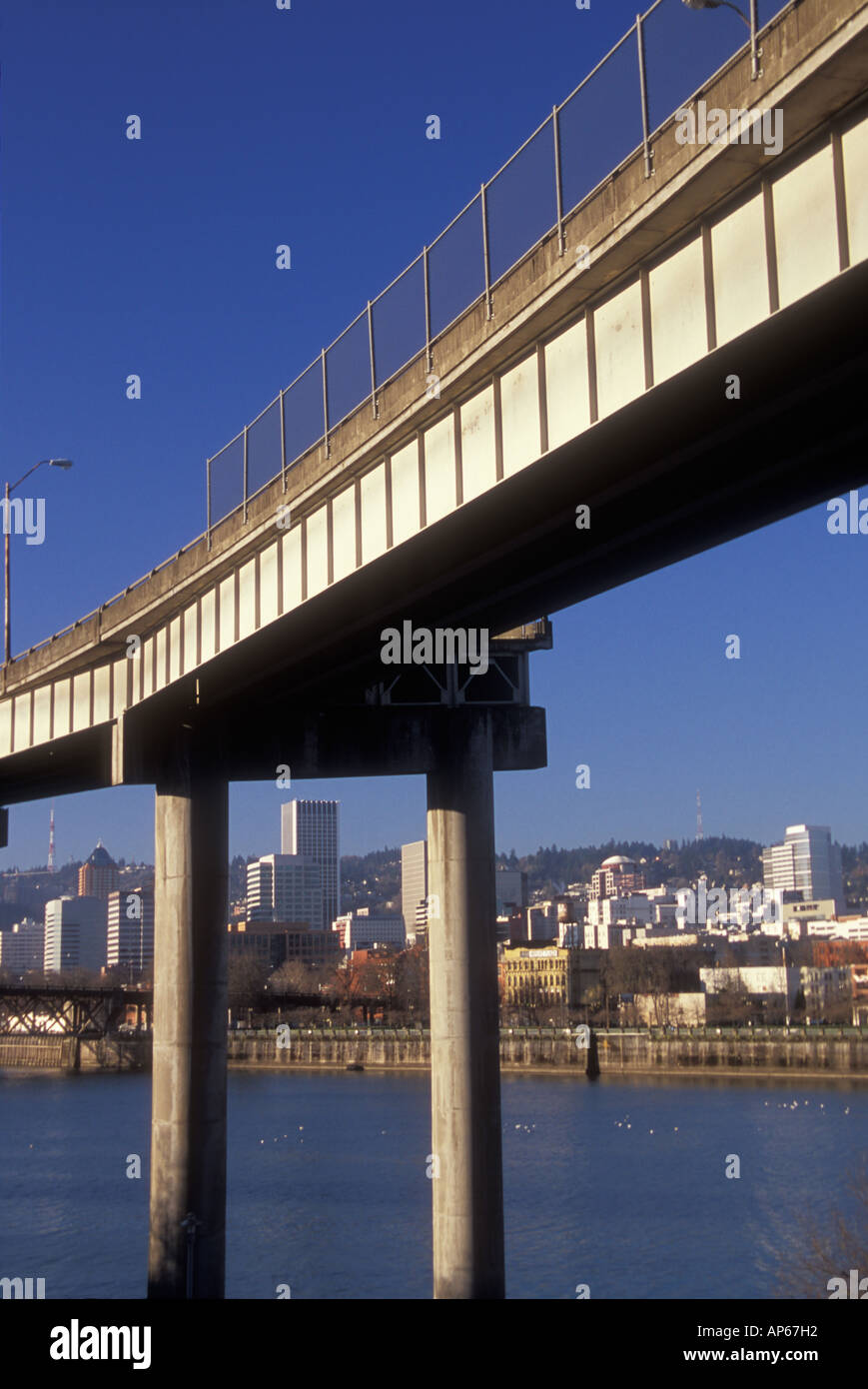 A highway interchange bridge stretches a bit over the Willamette River ...