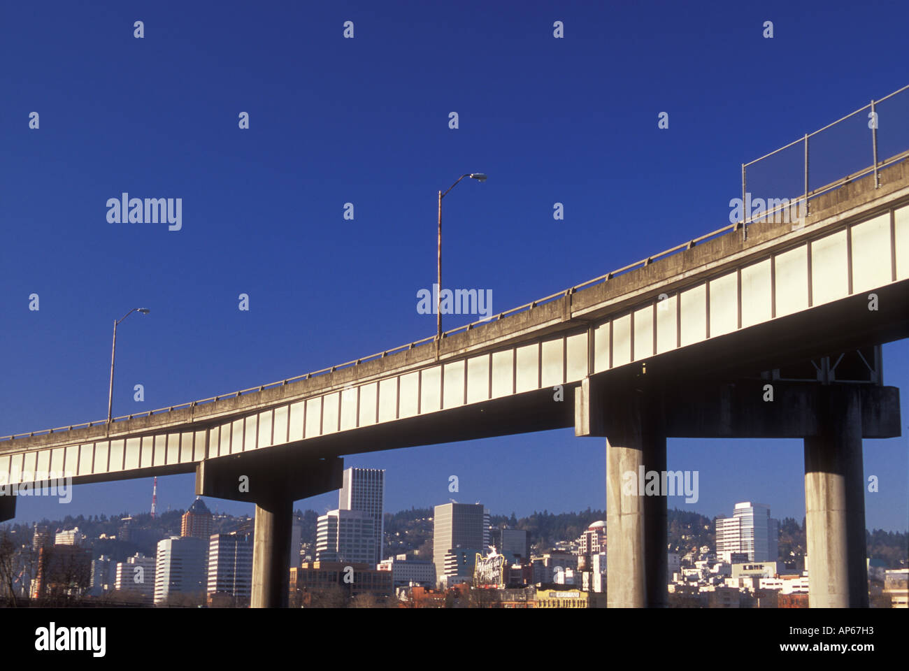A highway interchange bridge stretches a bit over the Willamette River ...