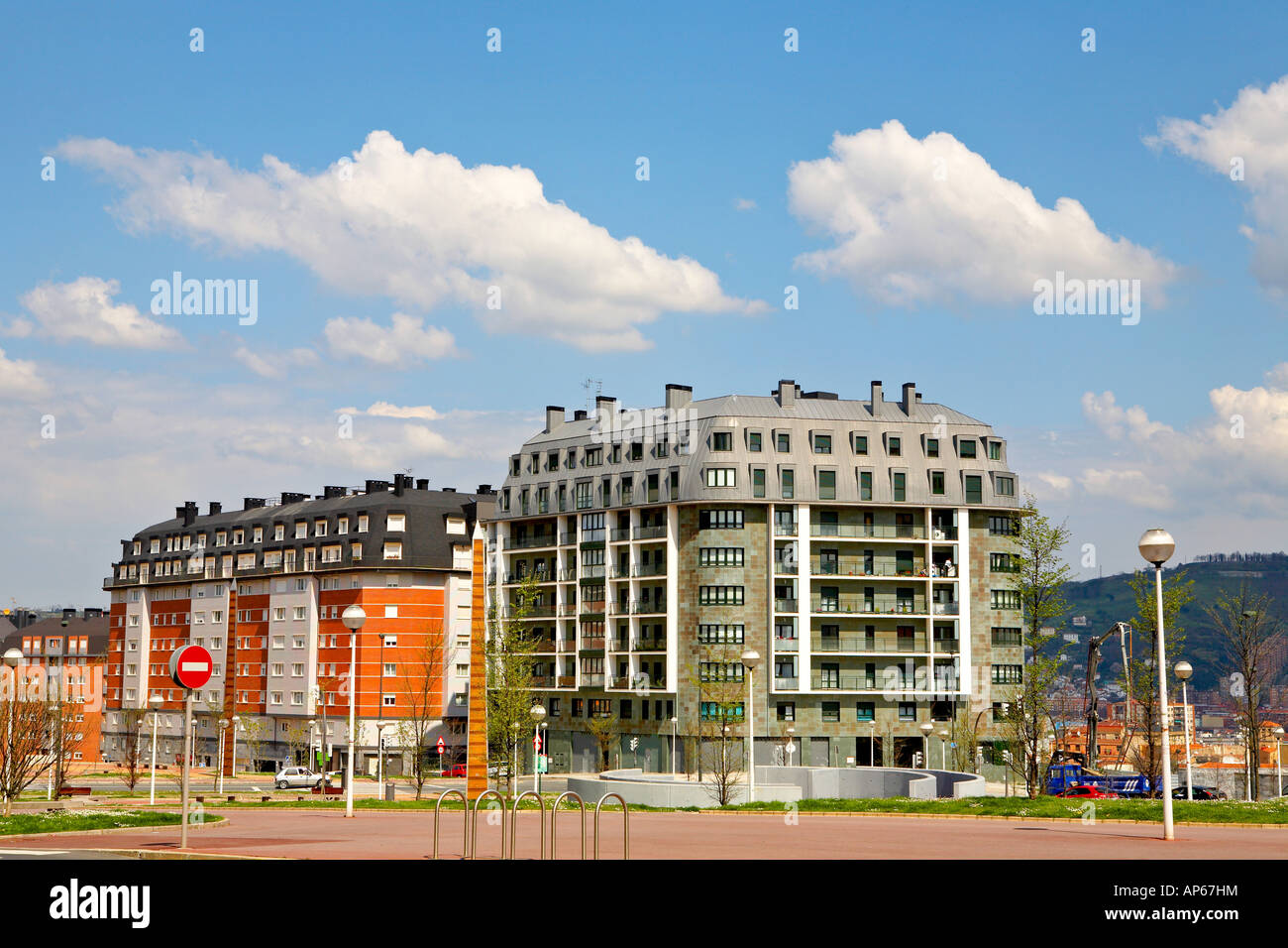 A built modern apartments blocks over a sunny sky Stock Photo - Alamy