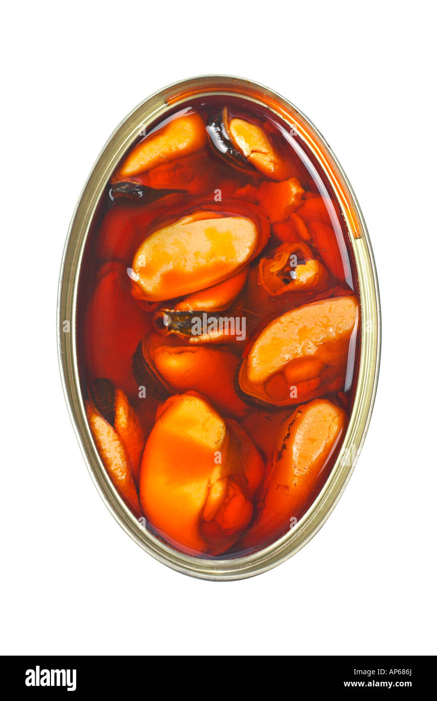 Some mussels canned isolated on white background Stock Photo - Alamy