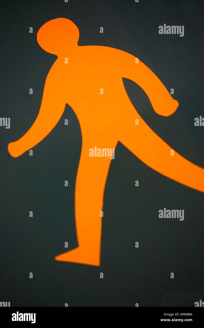 orange man walking sign signpost image Stock Photo - Alamy