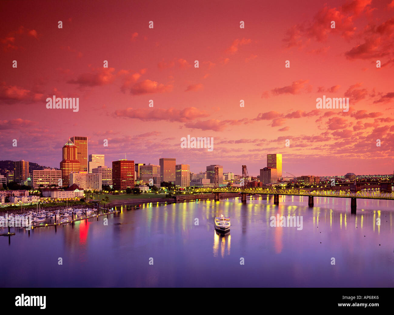 The Portland Spirit makes her way up the Willamette River, at sunrise ...