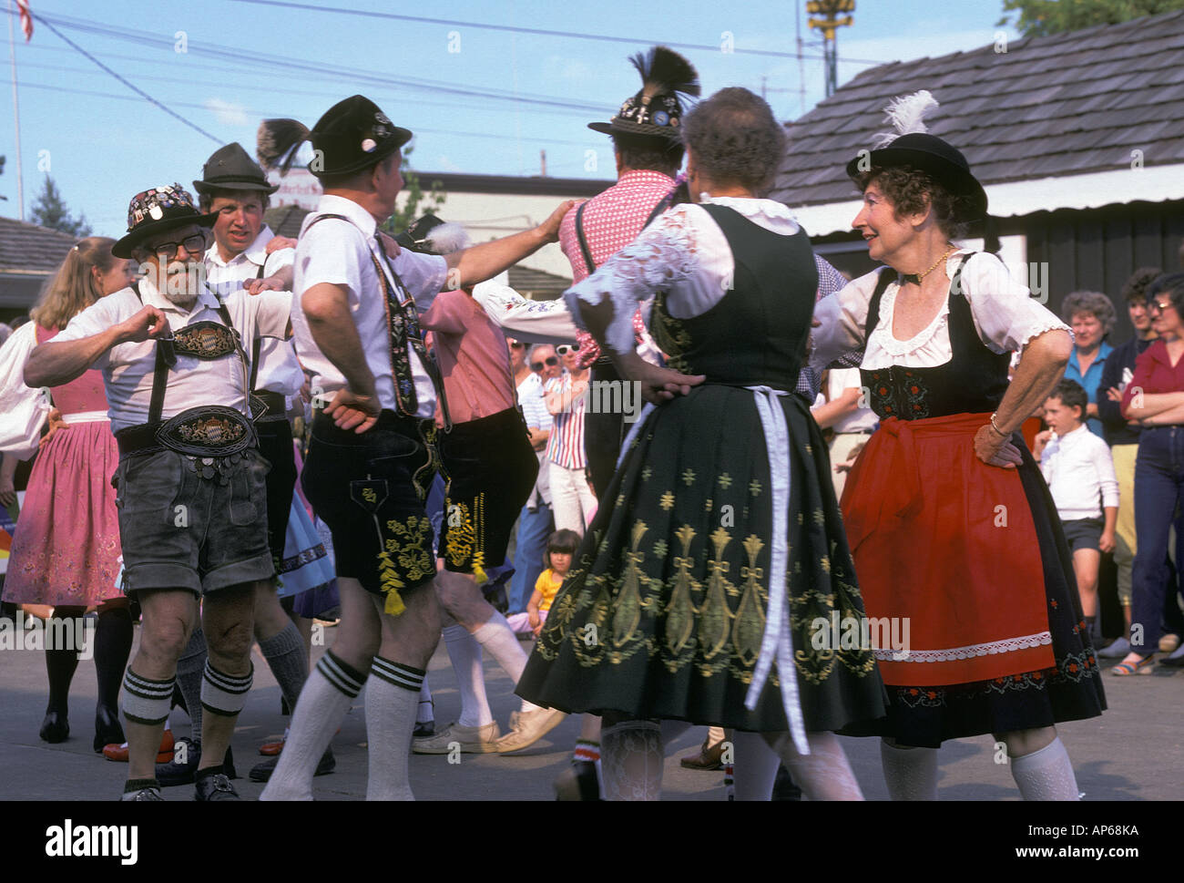 Dancers in traditional Bohemian dress enjoying themselves at ...