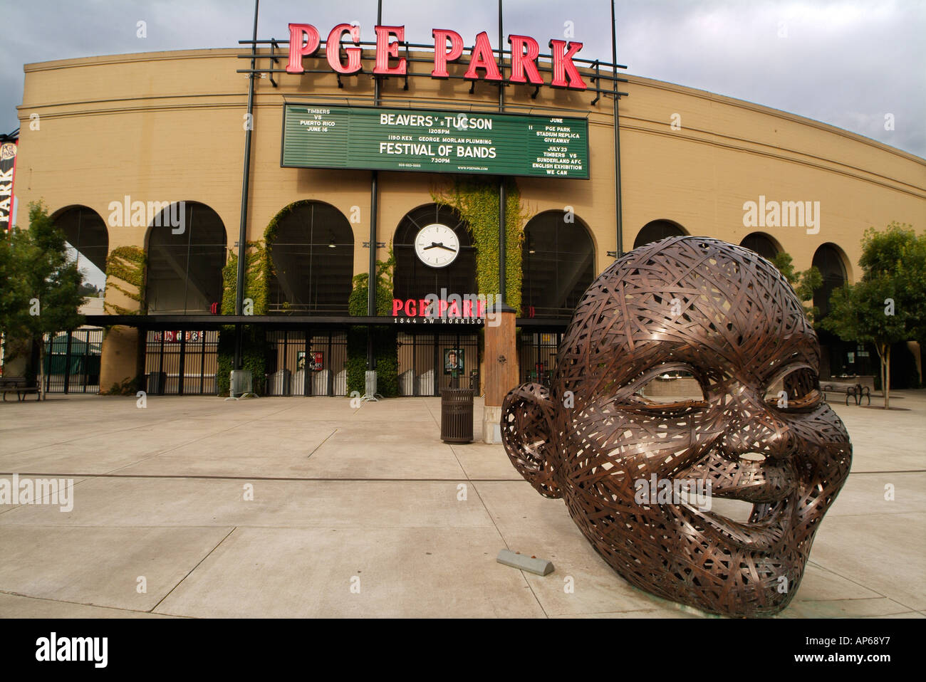 USA, Oregon, Portland, Smiling bronze face in front of PGE Park, home ...