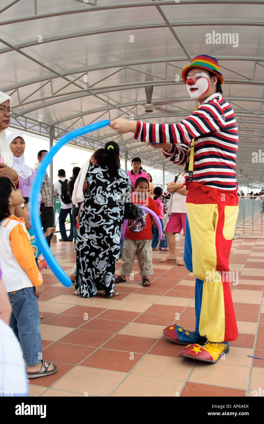 A clown entertaining children in Kuala Lumpur, Malaysia Stock Photo - Alamy