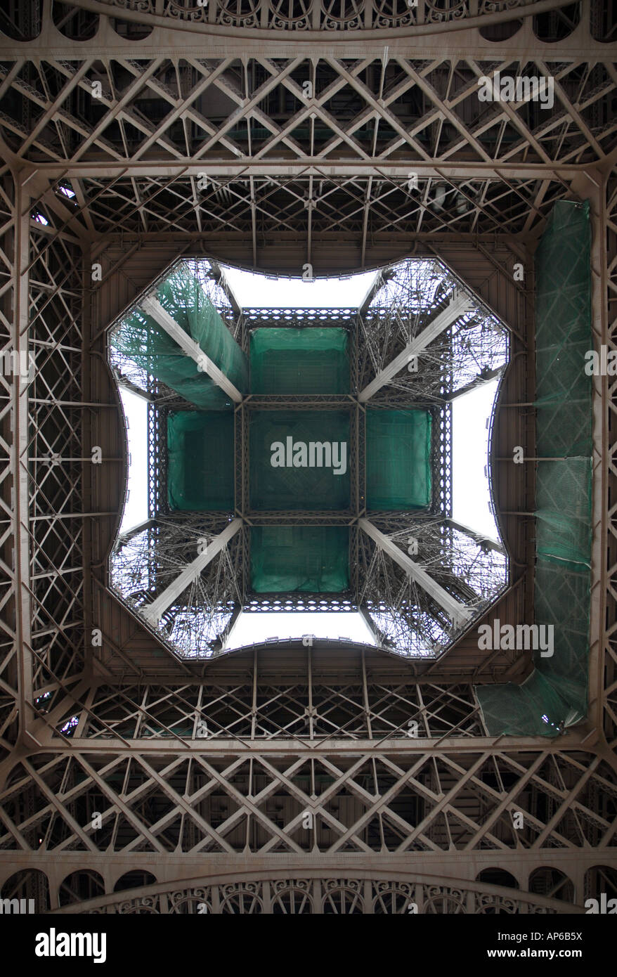 Looking up inside The Eiffel Tower in Paris, France from ground level ...