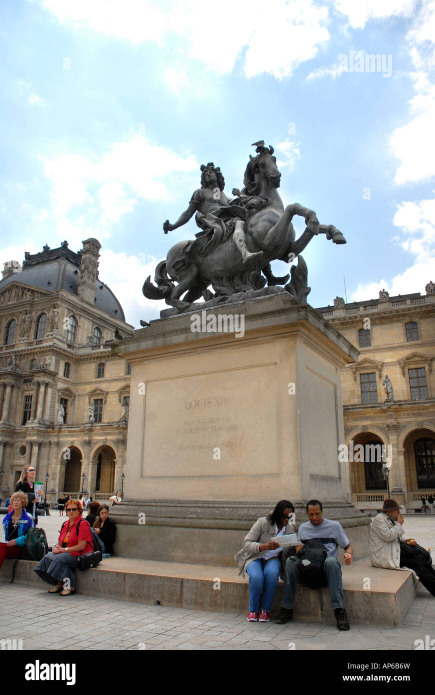 Statue of Louis XIV outside the Louvre (Musee du Louvre) in Paris ...