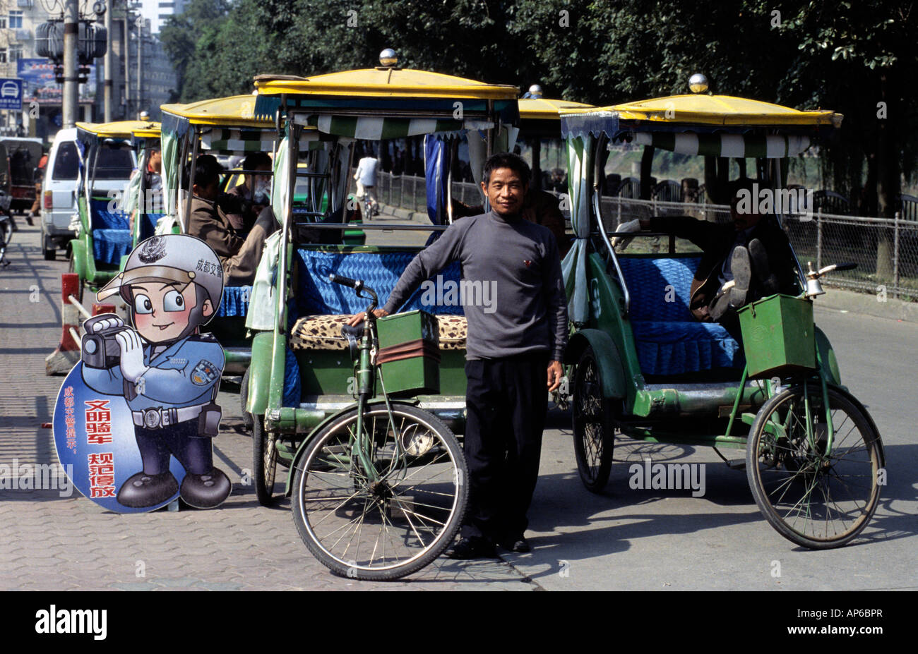 Chinese pedicabs hi-res stock photography and images - Alamy