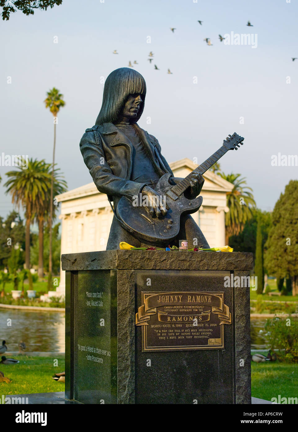 Johnny Ramone grave site with doves flying in the back Stock Photo - Alamy