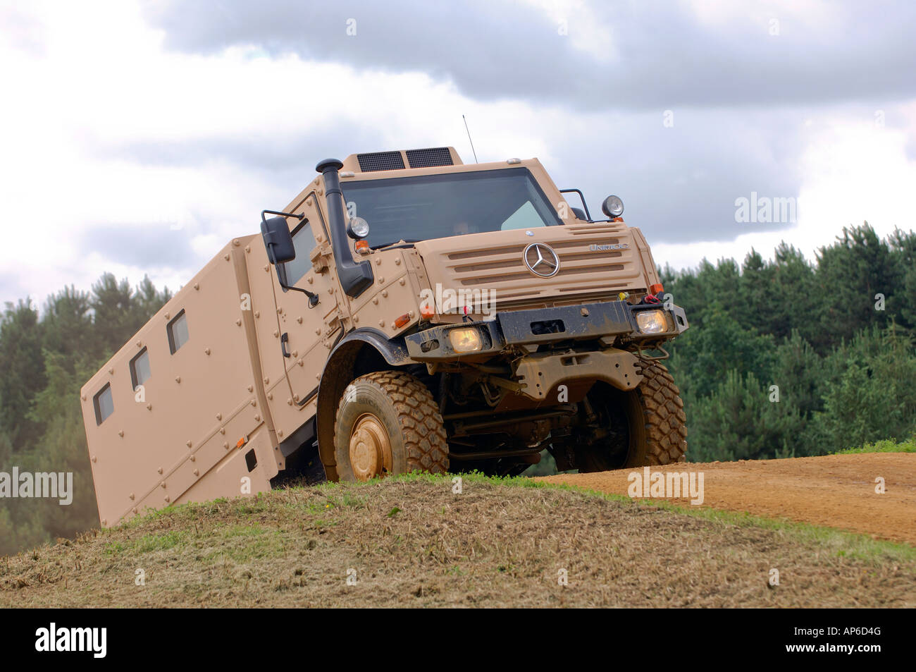 mercedes unimog being driven off road Stock Photo - Alamy