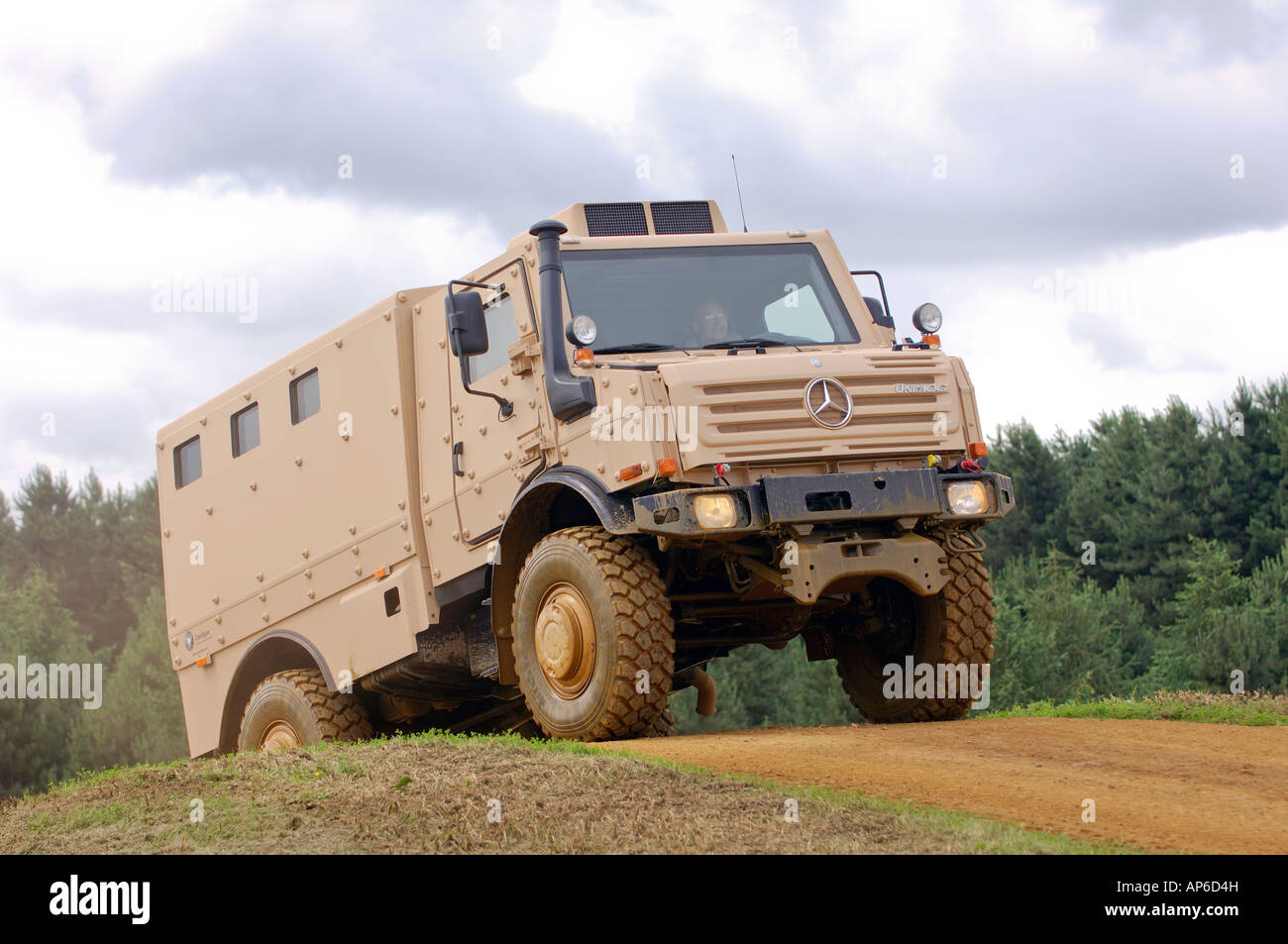 mercedes unimog being driven off road Stock Photo - Alamy