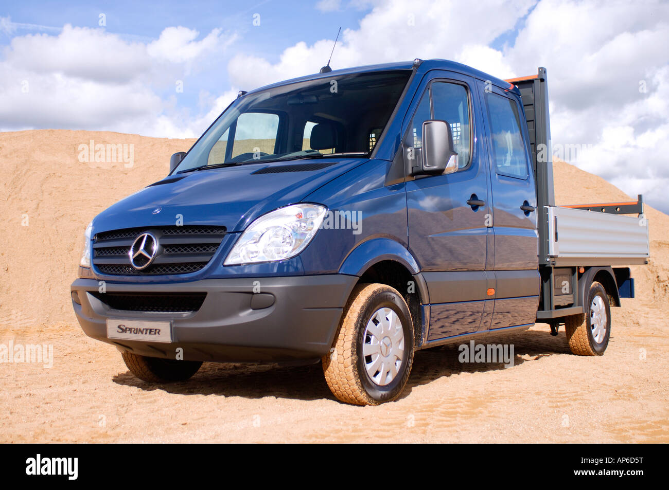 blue mercedes benz sprinter side loader van in sand quarry Stock Photo ...