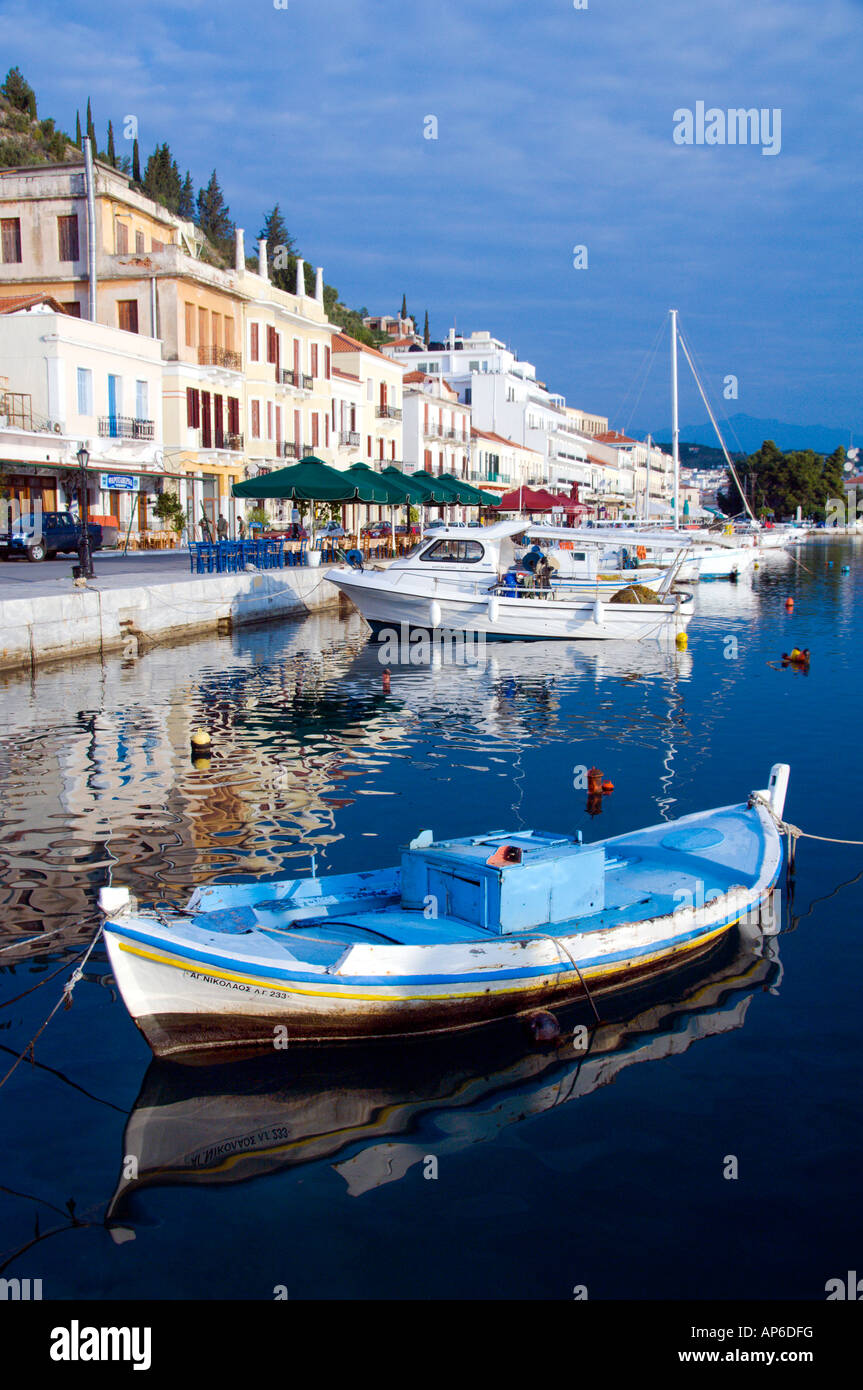Pastel colored buildings on the waterfront and colorful fishing boats ...