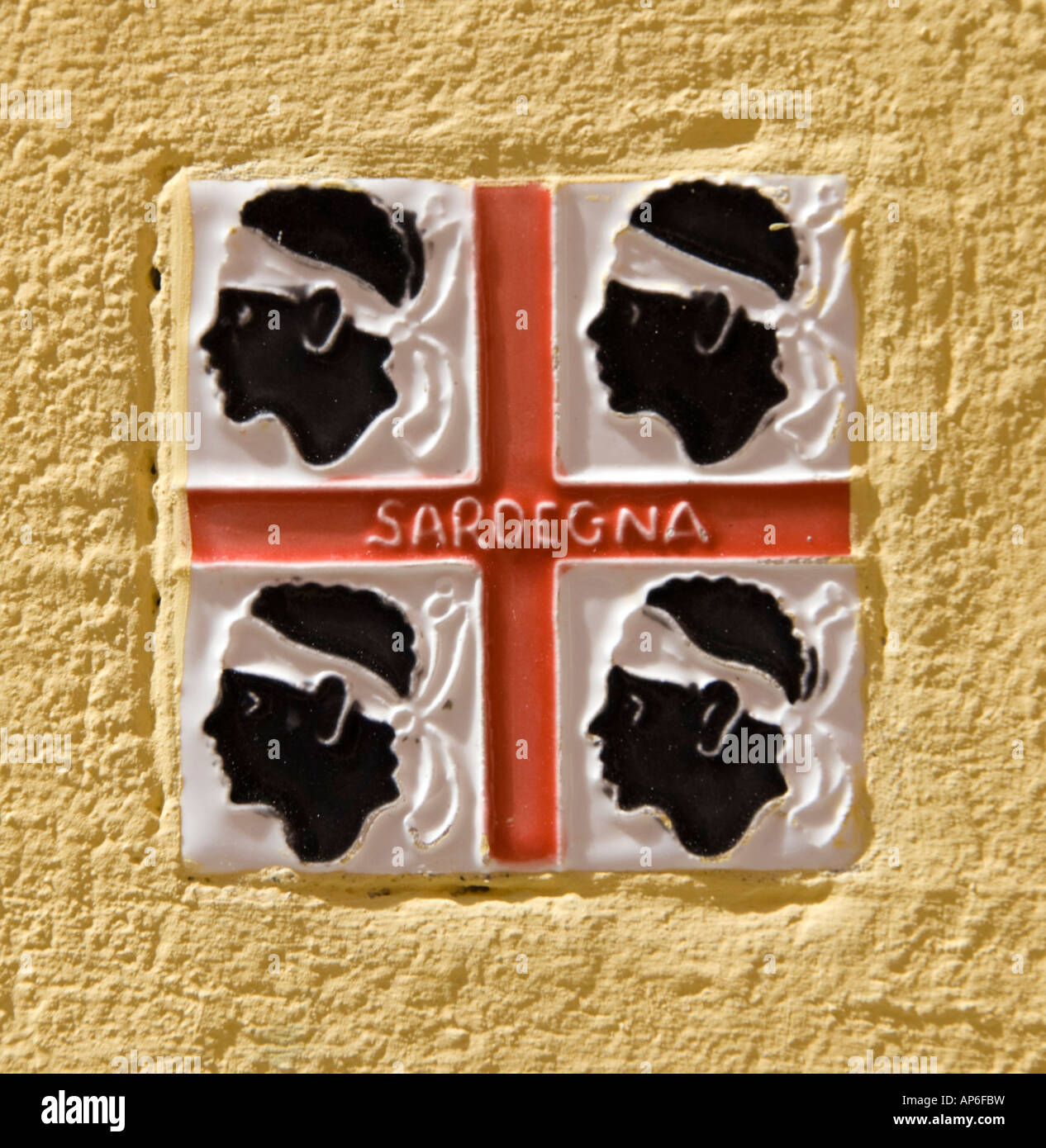 Plaque with symbol of Sardinia on house in Bosa Sardinia 2007 Stock ...