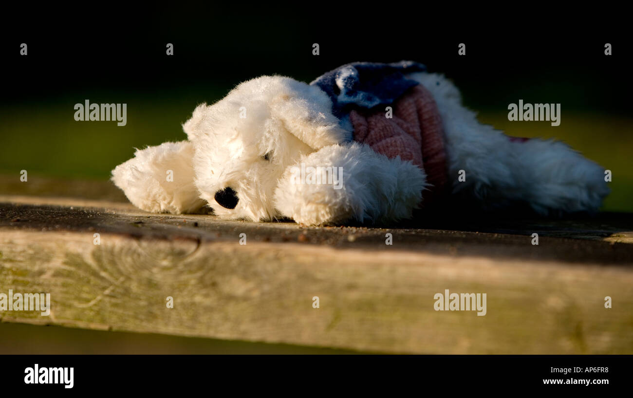 Child s toy left on a park bench Stock Photo - Alamy