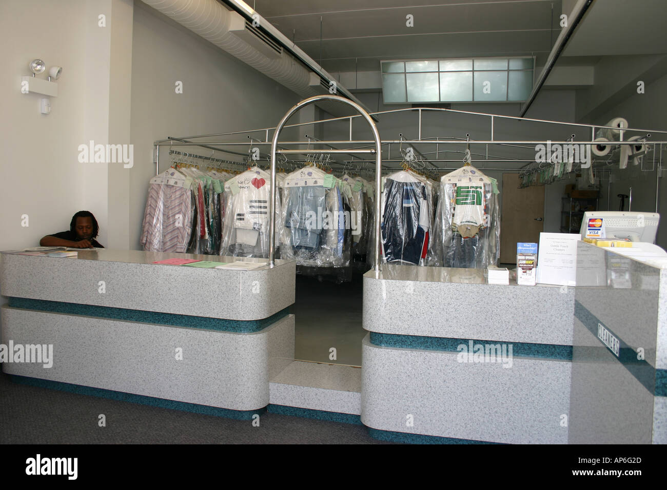 Man in dry cleaners hi-res stock photography and images - Alamy