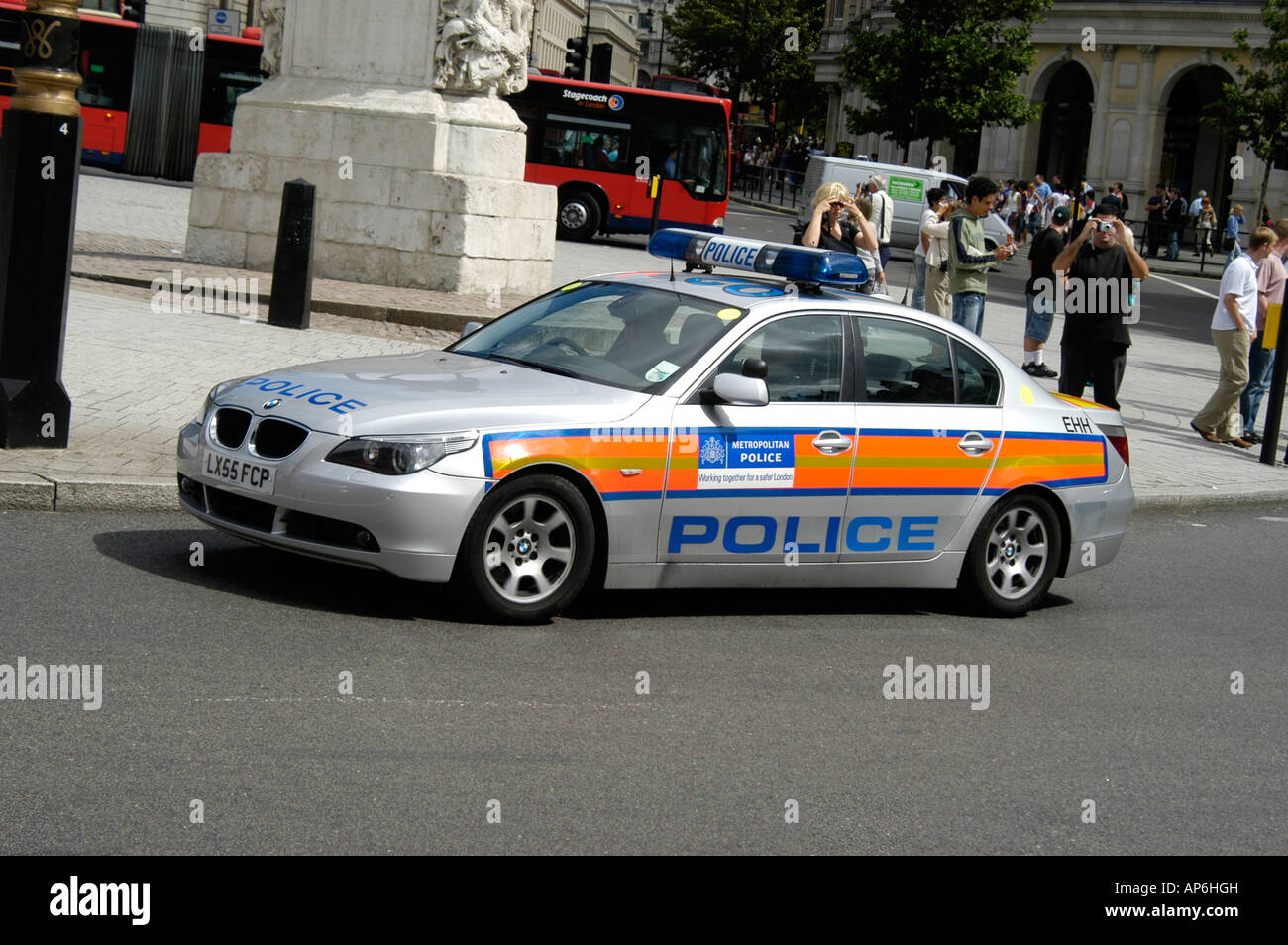 silver bmw police car driving through the city of london, england Stock ...