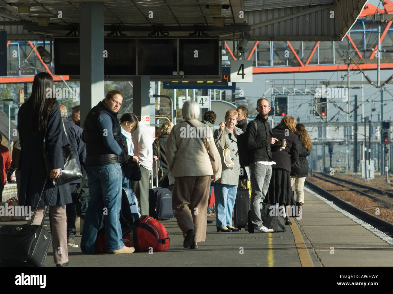 passengers waiting for a train at Cambridge railway station, england Stock Photo - Alamy