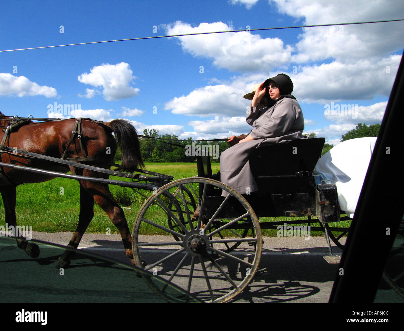 Amish woman bonnet hi-res stock photography and images - Alamy