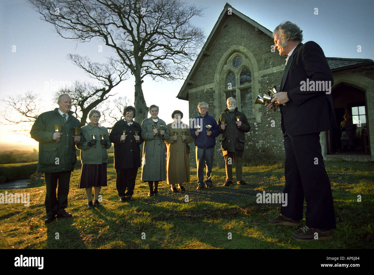Hand bell ringers hi-res stock photography and images - Alamy