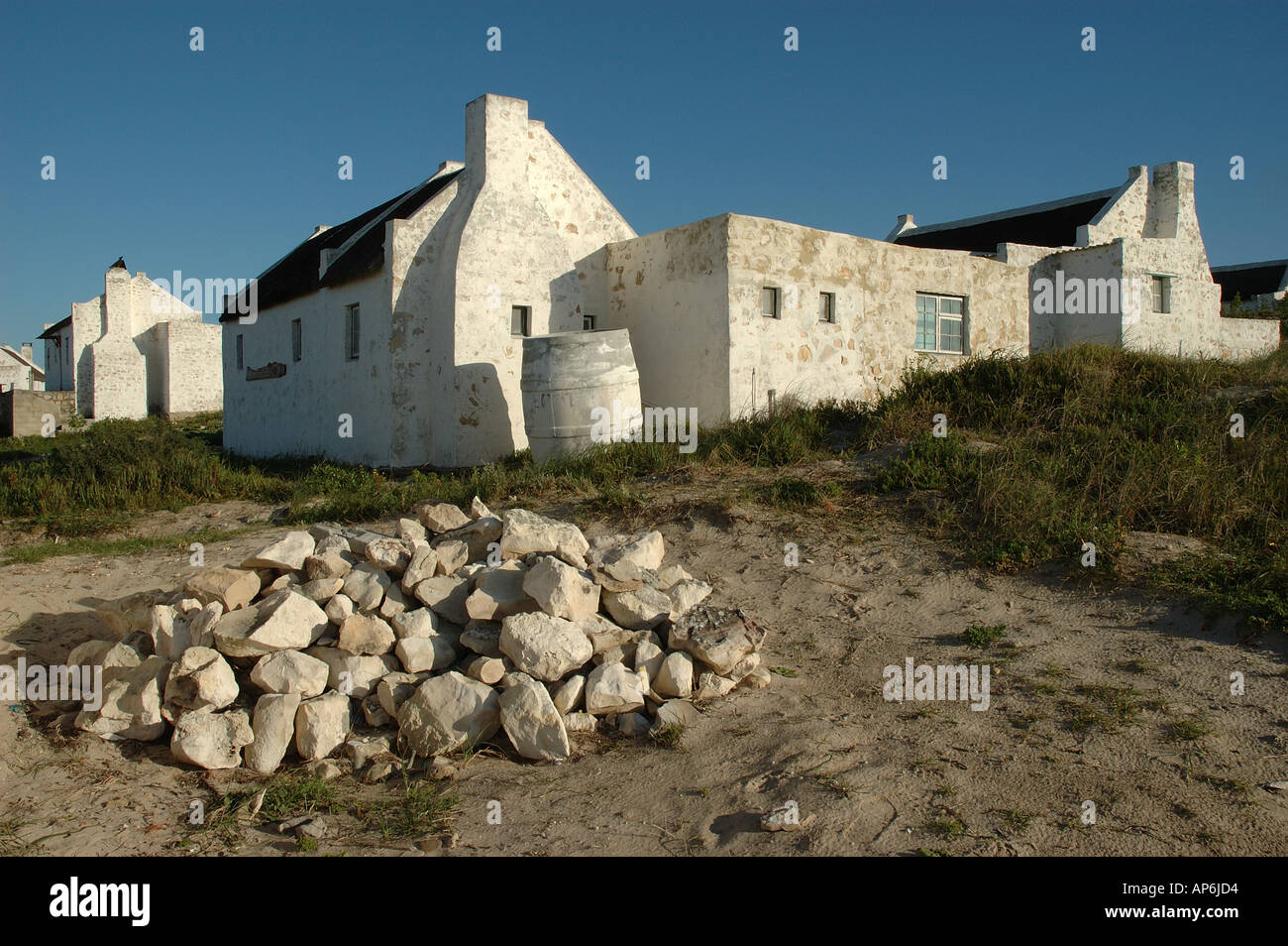 Picturesque stone and thatch fisherman s cottages overlook the ocean ...