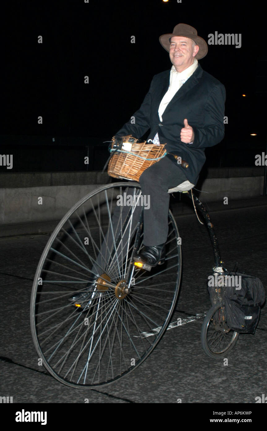 A man on the ordinary high wheel or penny farthing London England Stock ...