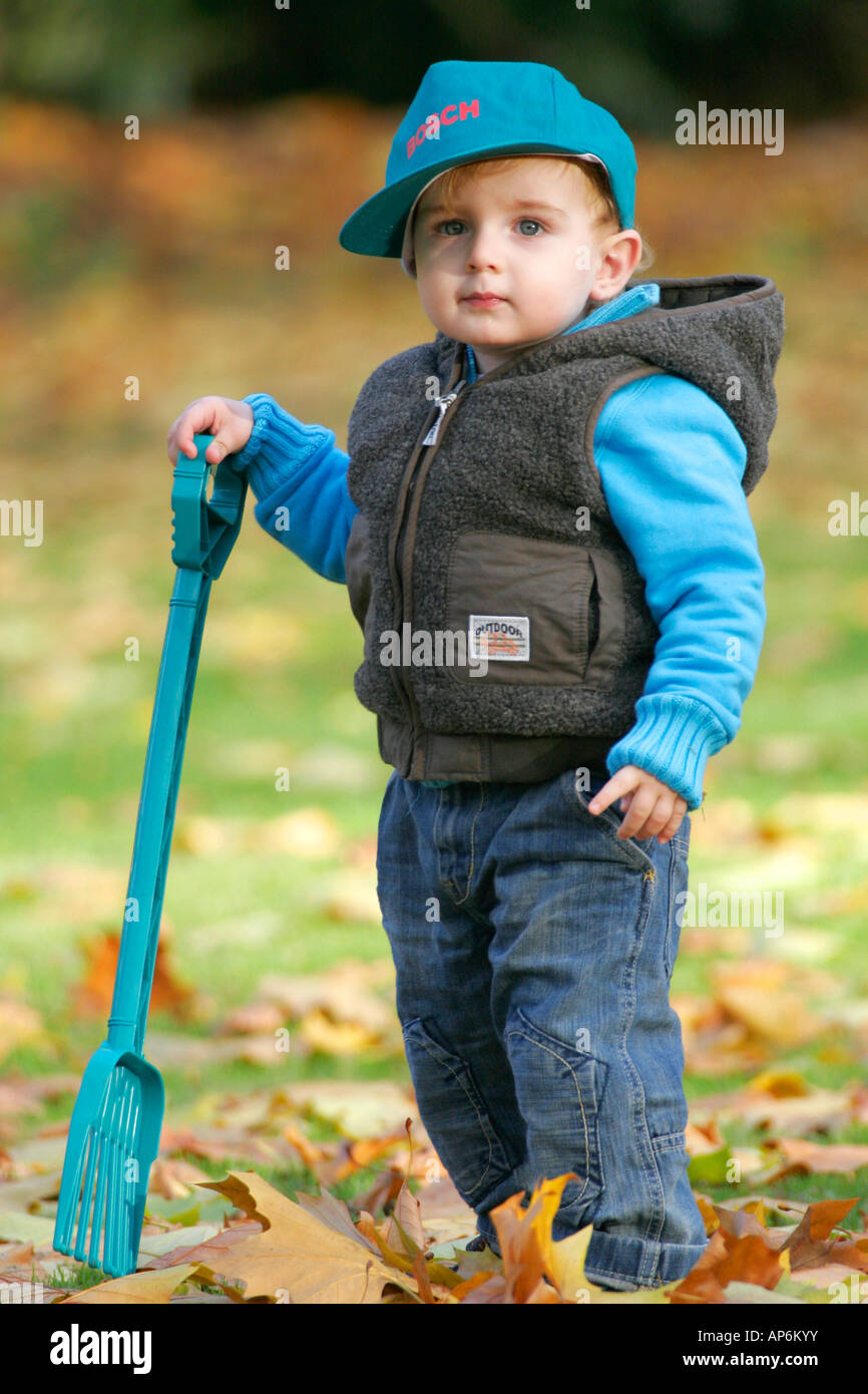 portrait of a little boy in the autumn foliage Stock Photo - Alamy