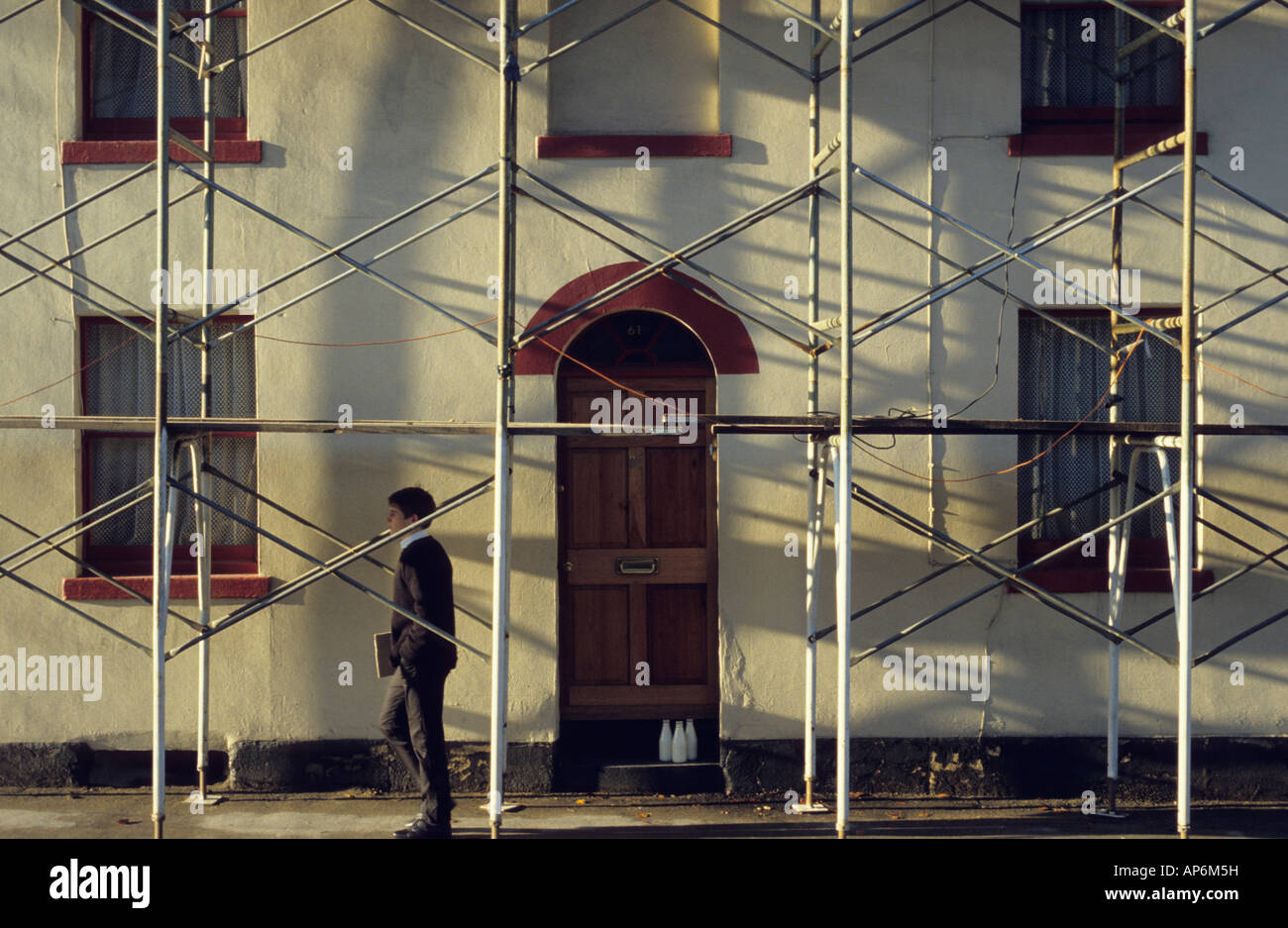 Scaffolding on house front Stock Photo - Alamy