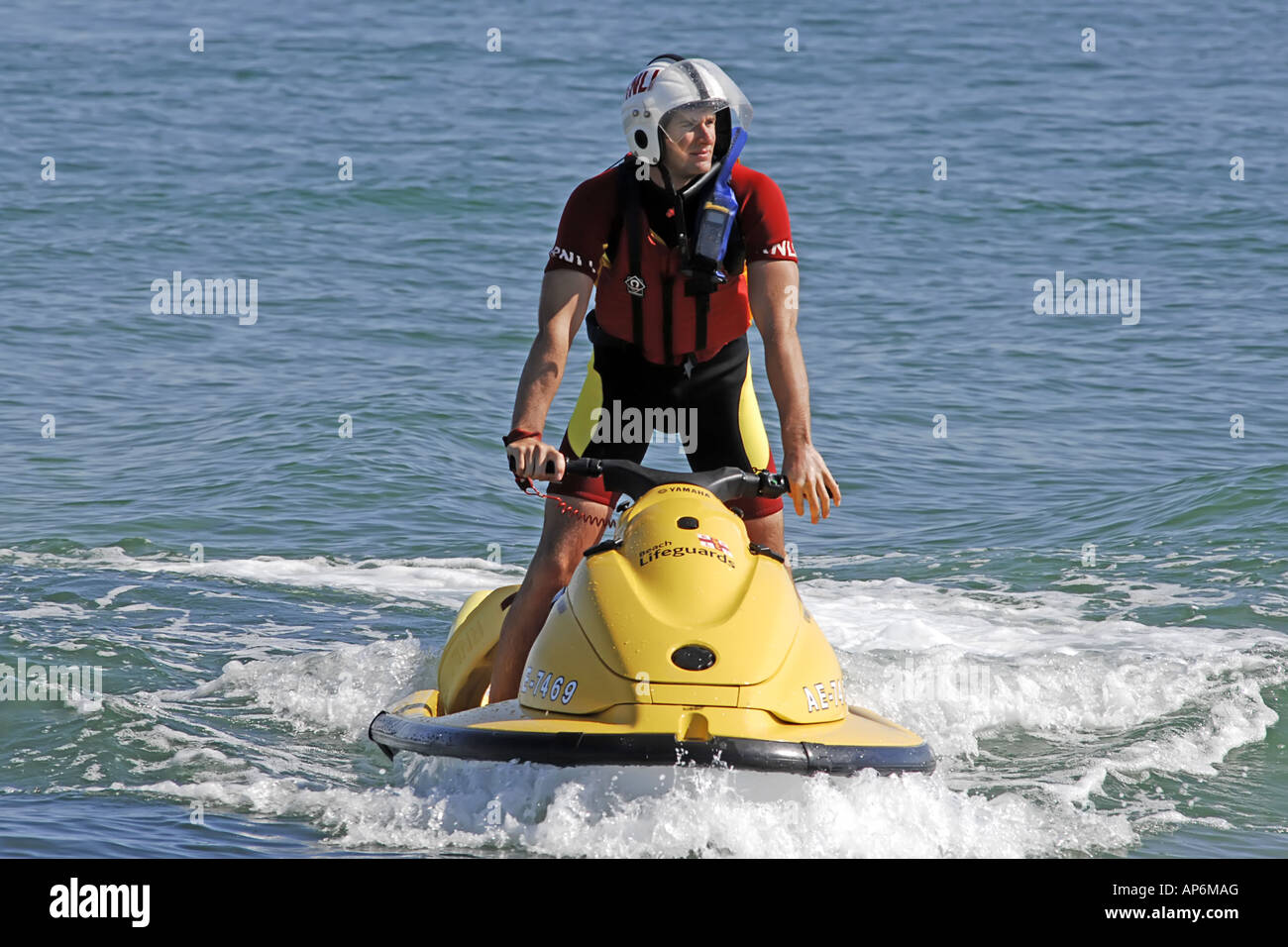 Lifeguard riding a jet ski hi-res stock photography and images - Alamy