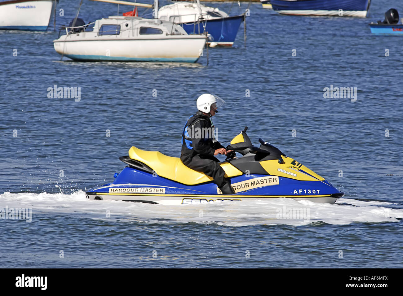 Harbour Master official riding a Jetski whilst on Patrol in Poole ...